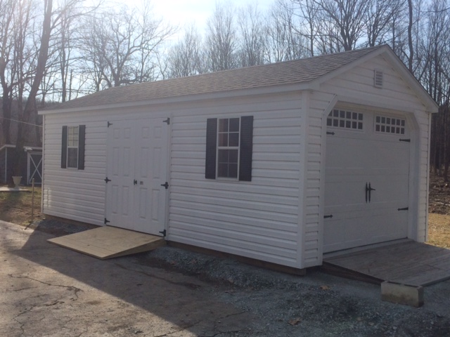 12x24 White vinyl sided Garage unit. - Shed Man, Inc.